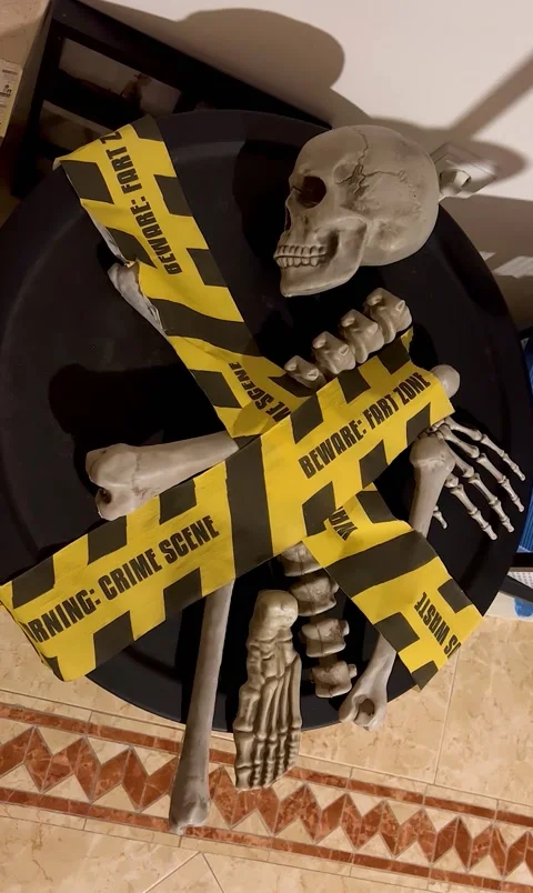 Skeleton on top of table Wrapped in Crim... | Stock Video | Pond5