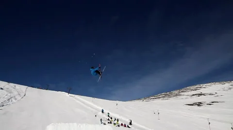A skier doing a jumping trick on skis in... | Stock Video | Pond5