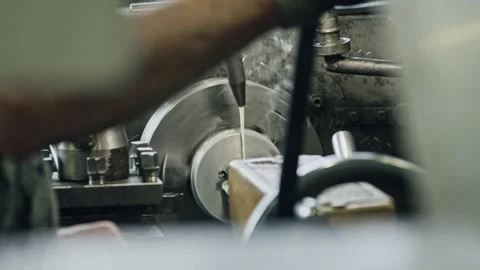 Skilled machinist using lathe machine in... | Stock Video | Pond5