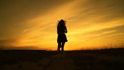 Skinny woman running to horizon on groun... | Stock Video | Pond5