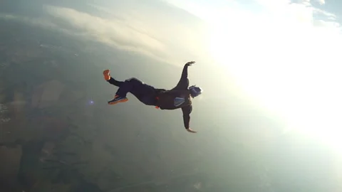 Skydiving student doing stunts in free f... | Stock Video | Pond5