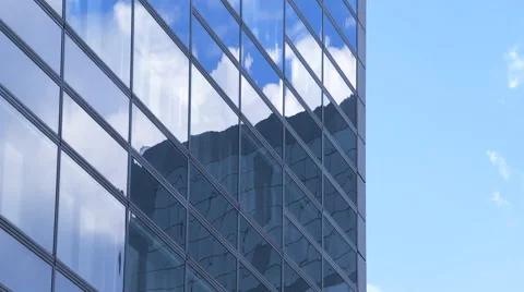 Skyscraper all-glass elevation with refl... | Stock Video | Pond5
