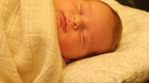 Sleeping newborn baby dolly shot closeup | Stock Video | Pond5