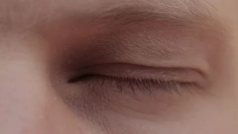 sleepy eye of a tired person, heavy eyel... | Stock Video | Pond5