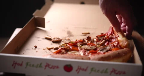 Slice of Supreme pizza in a take out pi... | Stock Video | Pond5
