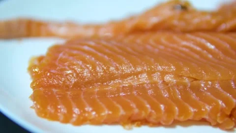 Sliced salted fresh salmon or smoked sal... | Stock Video | Pond5