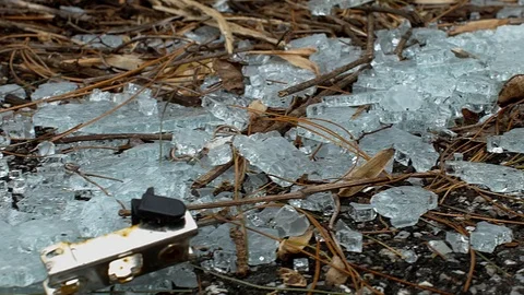 Slide over broken safety glass from an a... | Stock Video | Pond5