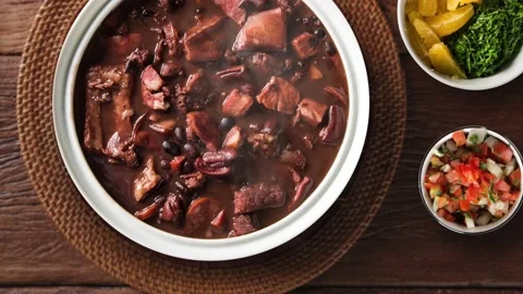 Slide shot Brazilian feijoada on the tab... | Stock Video | Pond5