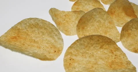 Slider shot of potato chips in macro. Po... | Stock Video | Pond5