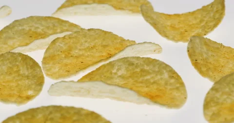 Slider shot of potato chips in macro. Po... | Stock Video | Pond5