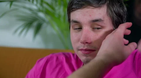 Sliding a hand down a partners face | Stock Video | Pond5