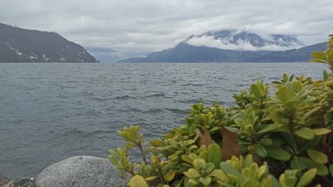 Slightly choppy Lake Como waters under g... | Stock Video | Pond5