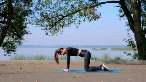 Slim 30s woman in black sportswear pract... | Stock Video | Pond5