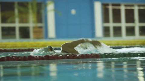 Slim fit professional woman swimmer trai... | Stock Video | Pond5