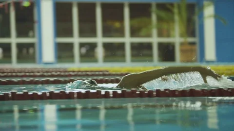 Slim fit professional woman swimmer trai... | Stock Video | Pond5