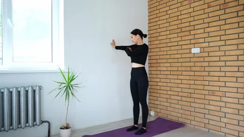 Slim sporty 30s woman lean her hand on t... | Stock Video | Pond5