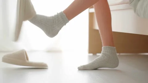 Slippers fly off the child's feet and ca... | Stock Video | Pond5