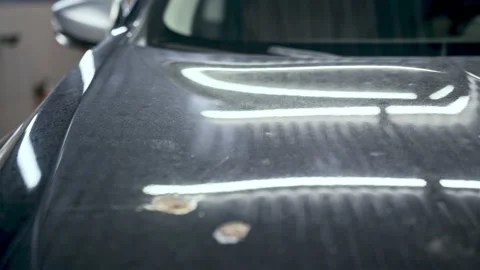 Сlose up of car hood with bird dropping... | Stock Video | Pond5