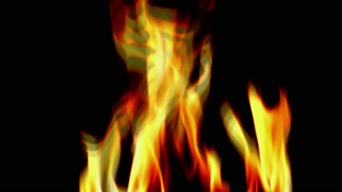 Slow fire flame glowing and burning on b... | Stock Video | Pond5