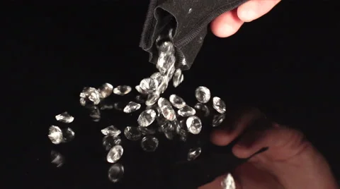 SLOW: Human hand fall out a lot of a dia... | Stock Video | Pond5