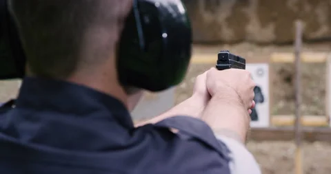 Slow Mo Of Man Shooting A Gun At Shootin... | Stock Video | Pond5