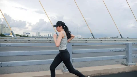 Slow motion Asian woman running fast on ... | Stock Video | Pond5
