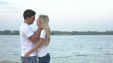 Slow Motion An Attractive Couple Kissing... | Stock Video | Pond5