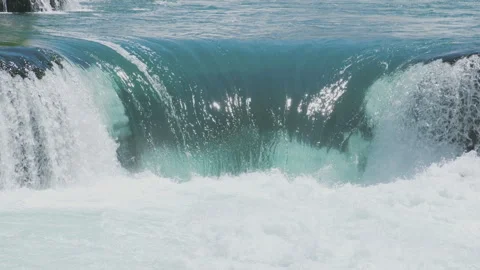 Slow motion of a beautiful foamy cascade... | Stock Video | Pond5