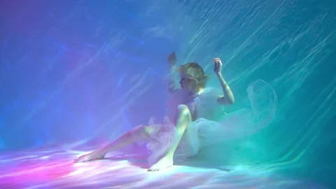 Slow Motion beautiful girl in a dress sw... | Stock Video | Pond5