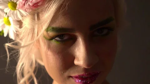 Slow Motion Beautiful model with a wreat... | Stock Video | Pond5