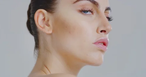 Slow motion of beautiful woman face with... | Stock Video | Pond5