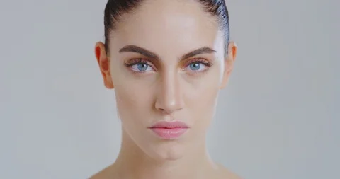 Slow motion of beautiful woman face with... | Stock Video | Pond5