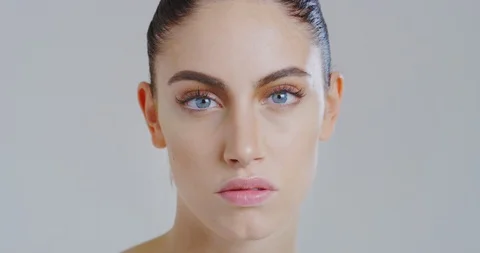 Slow motion of beautiful woman face with... | Stock Video | Pond5