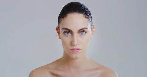 Slow motion of beautiful woman face with... | Stock Video | Pond5