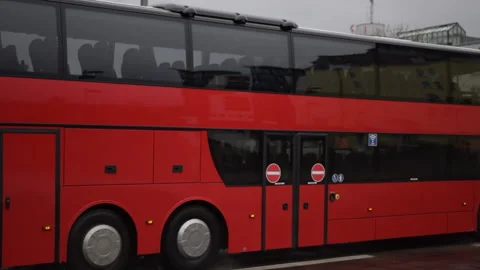 SLOW MOTION: Big Red Bus passing by on R... | Stock Video | Pond5