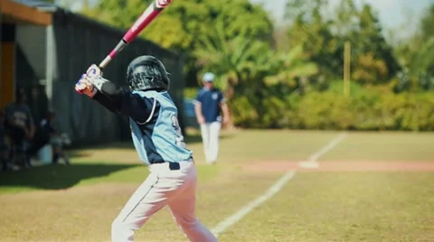 Slow motion of boy batting at baseball g... | Stock Video | Pond5