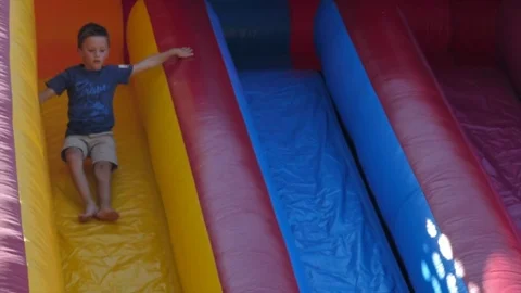 Girl Going Down Waterslide Stock Footage ~ Royalty Free Stock Videos ...