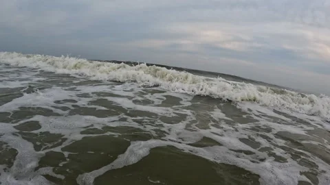 Slow-motion, canted-angle view of green ... | Stock Video | Pond5