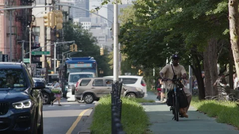 slow motion car and bike lanes on Allen ... | Stock Video | Pond5