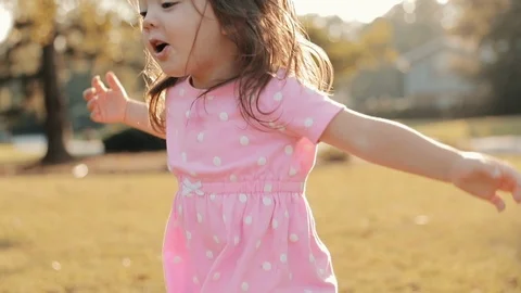 Slow Motion Close Up Little Girl Jumping... | Stock Video | Pond5