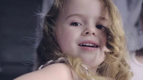 SLOW MOTION: Close-up portrait of a cute... | Stock Video | Pond5