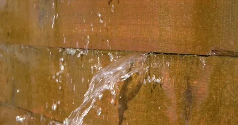 Slow motion close up of water leaking th... | Stock Video | Pond5