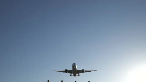 Slow motion commercial passenger jet fli... | Stock Video | Pond5