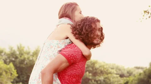 In slow motion cute couple in the park | Stock Video | Pond5