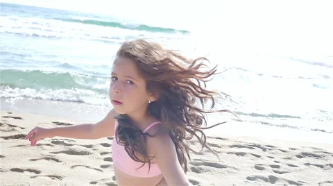 Slow motion of a cute little girl in swi... | Stock Video | Pond5