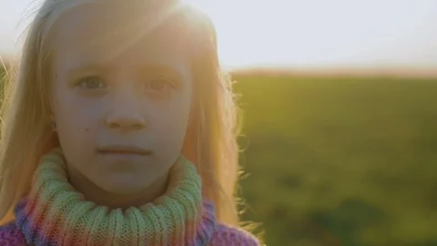 slow motion cute twin girls in sweaters ... | Stock Video | Pond5