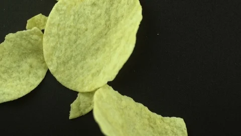 Slow Motion Fallen Potato Chip or Snack ... | Stock Video | Pond5