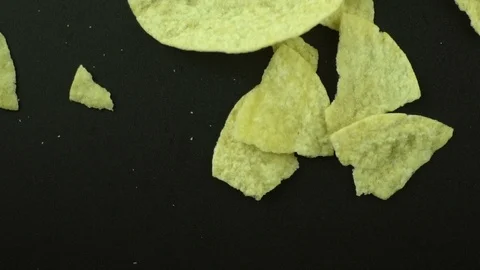 Slow Motion Fallen Potato Chip or Snack ... | Stock Video | Pond5