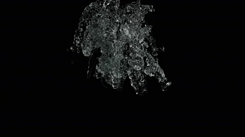 Slow motion falling water flow on a blac... | Stock Video | Pond5
