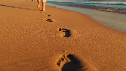 Slow motion following a person walking a... | Stock Video | Pond5